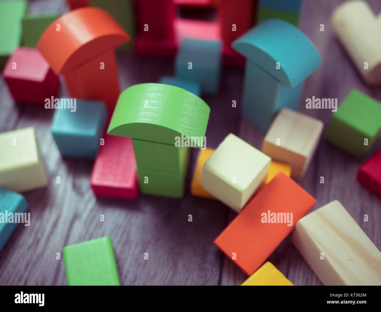 Wooden toy blocks background Stock Photo - Alamy