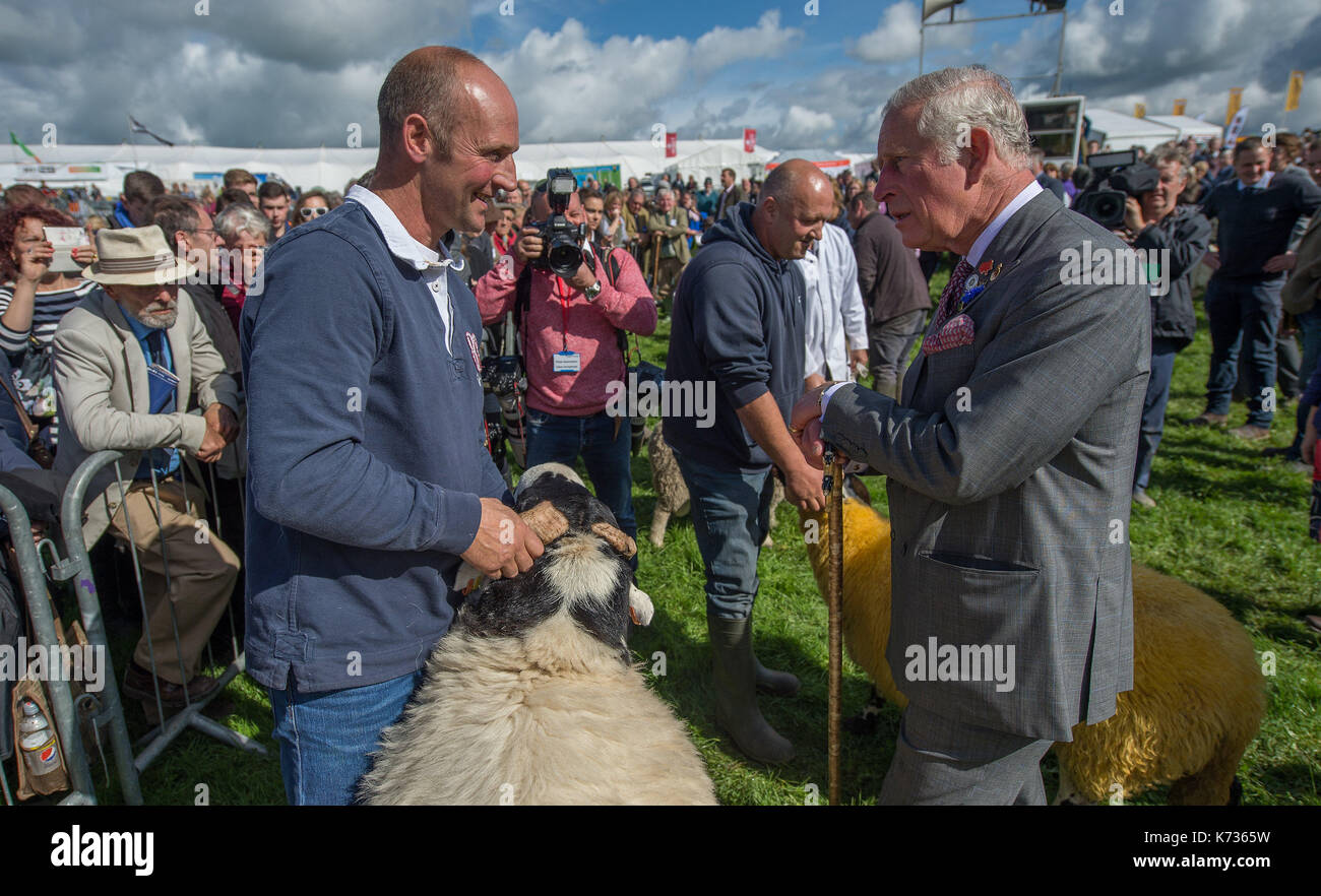 The Prince of Wales talks with Mr Ericson about his sheep during his ...
