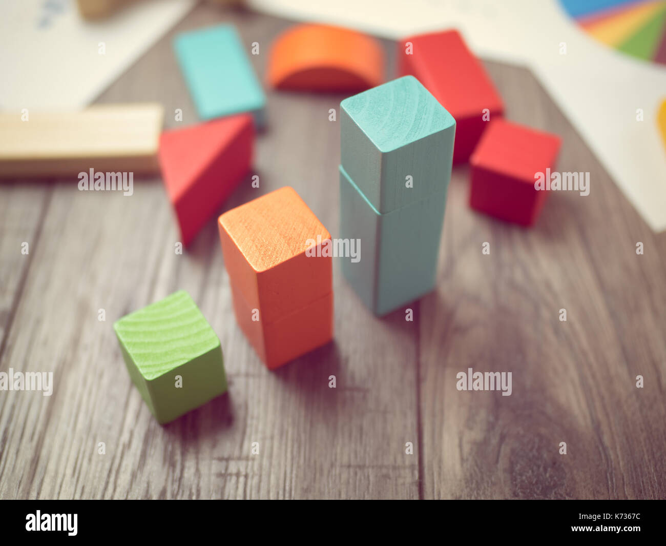 Wooden toy blocks background Stock Photo - Alamy