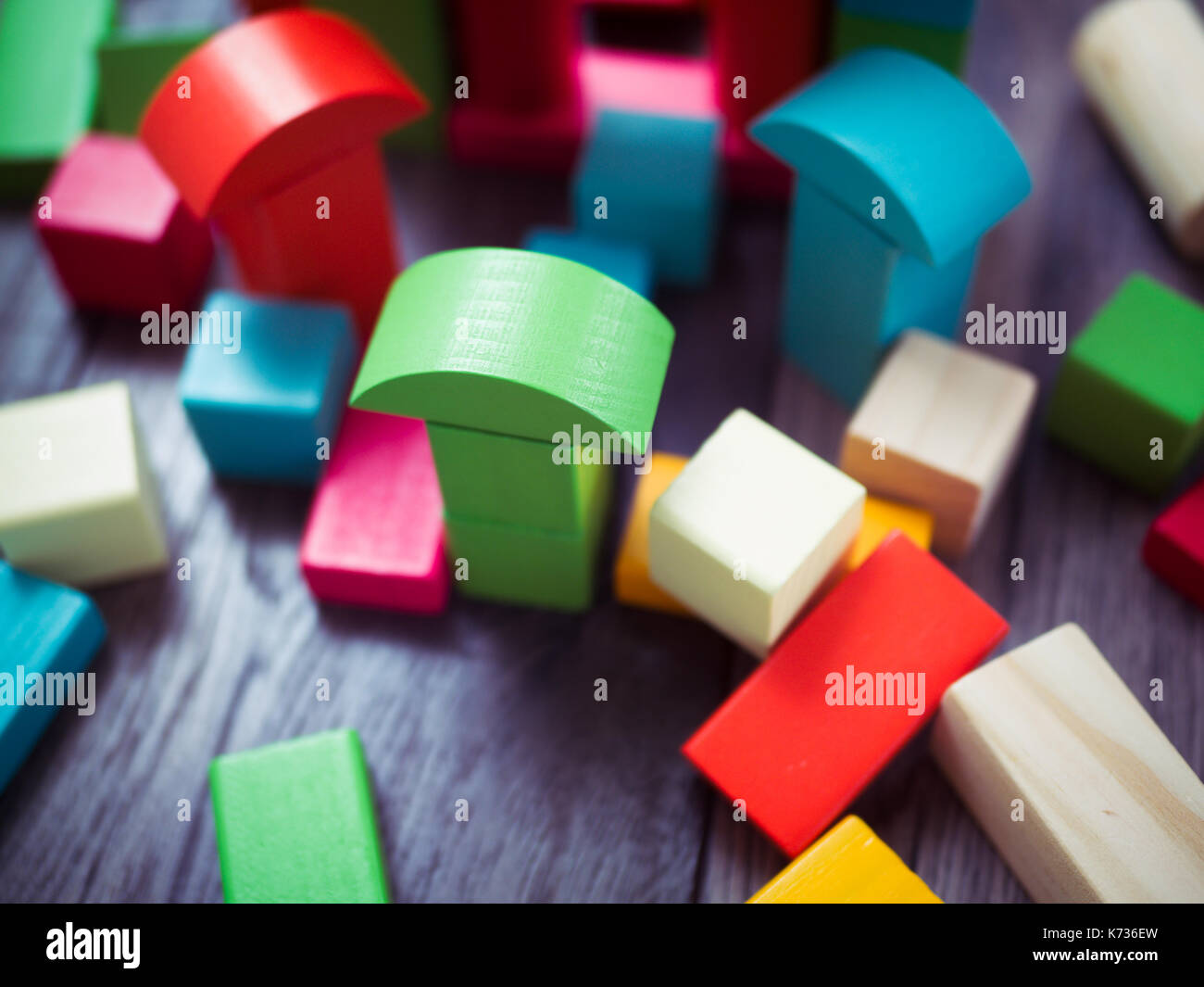 Wooden toy blocks background Stock Photo - Alamy