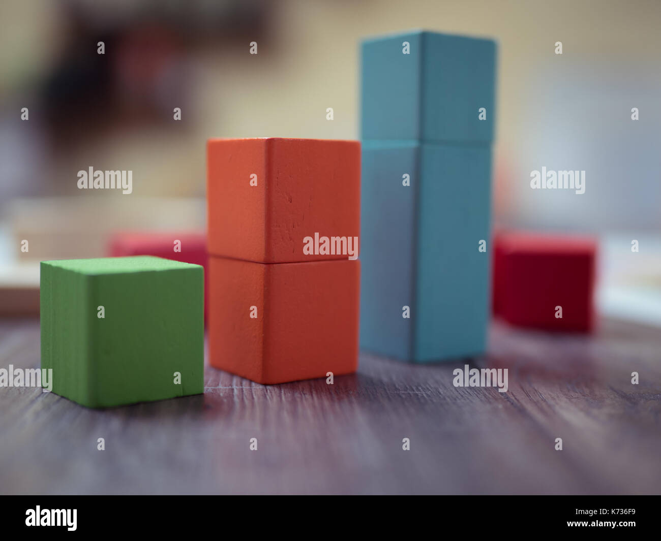 Wooden toy blocks background Stock Photo - Alamy