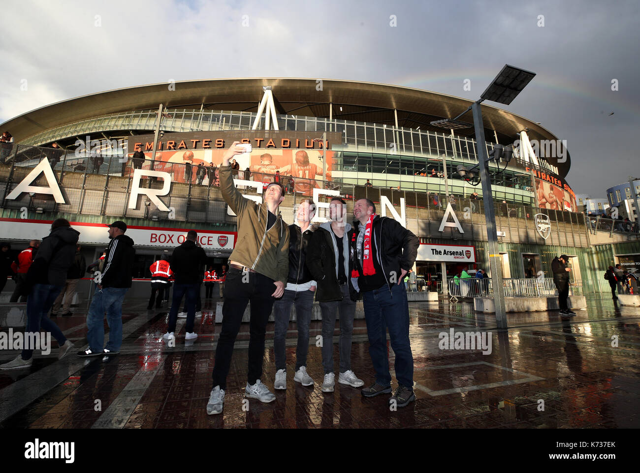 Arsenal fans outside the Emirates Stadium, London Stock Photo - Alamy