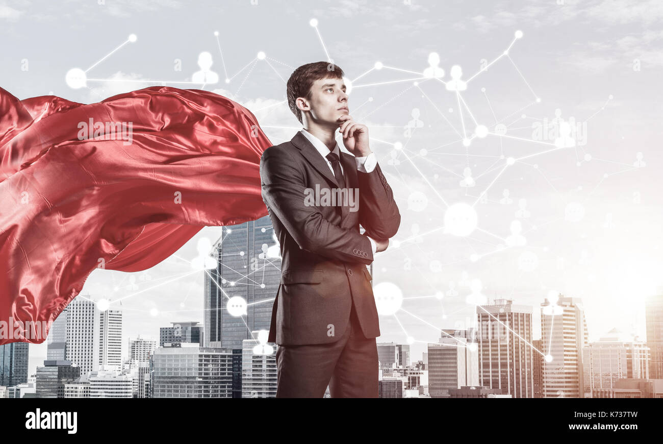 Concept of power and sucess with businessman superhero in big ci Stock ...