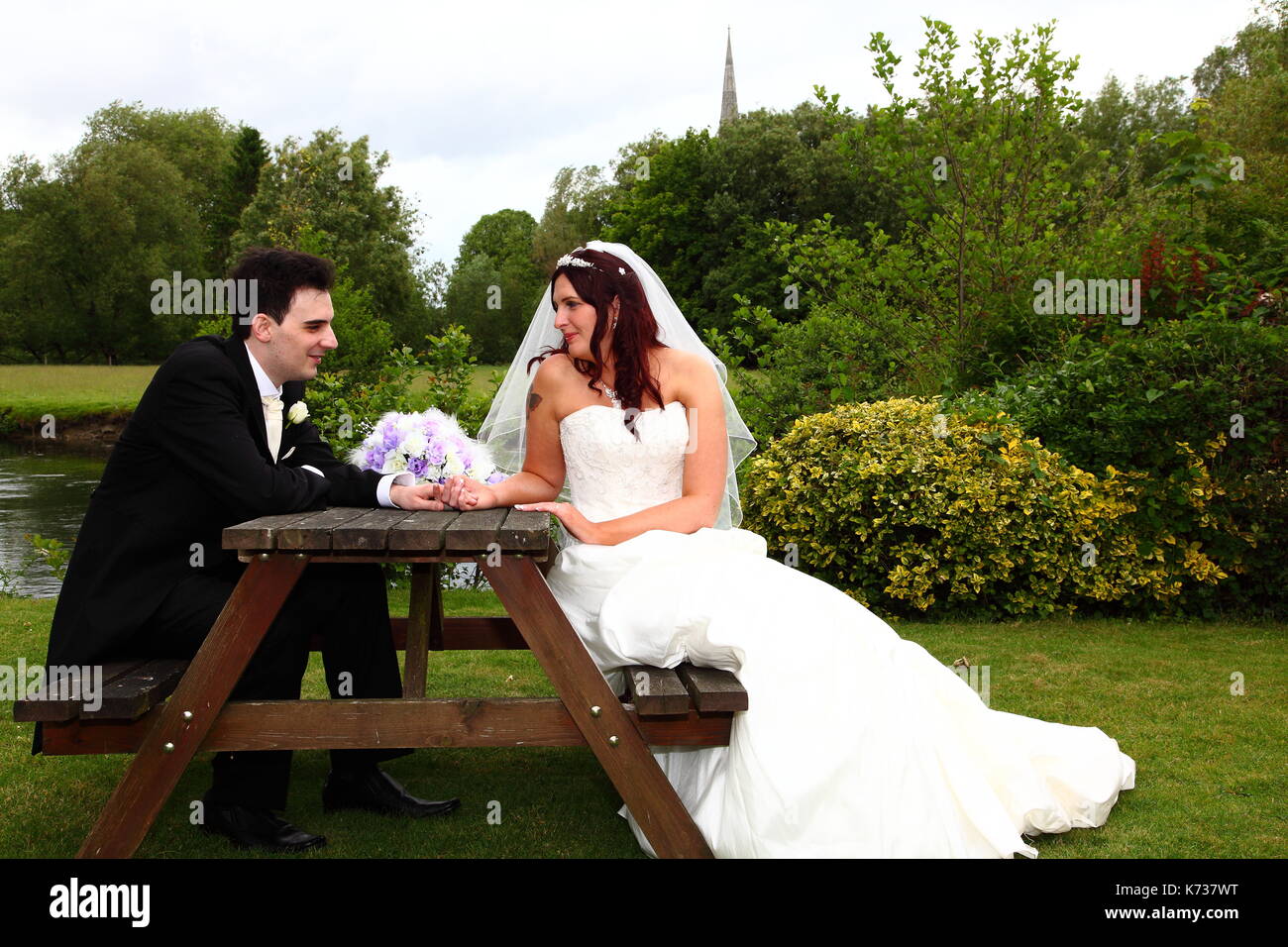 Wedding Photographs, a couple celebrate their special day with family ...