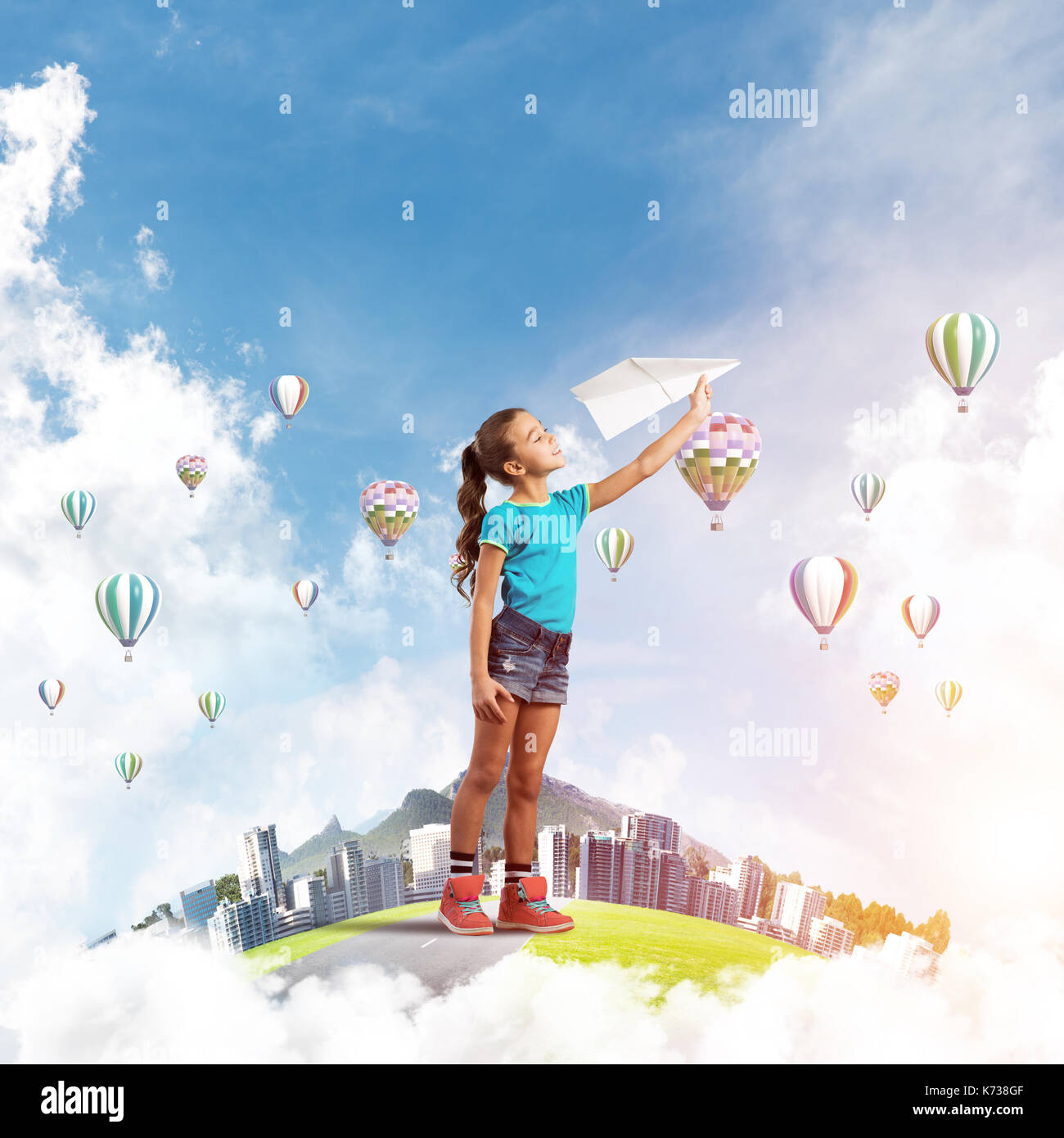 Concept of careless happy childhood with girl dreaming about future ...