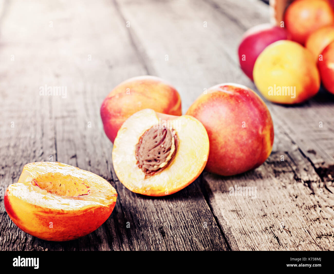 Fresh ripe nectarine peach, crop harvest rustic background, healthy ...