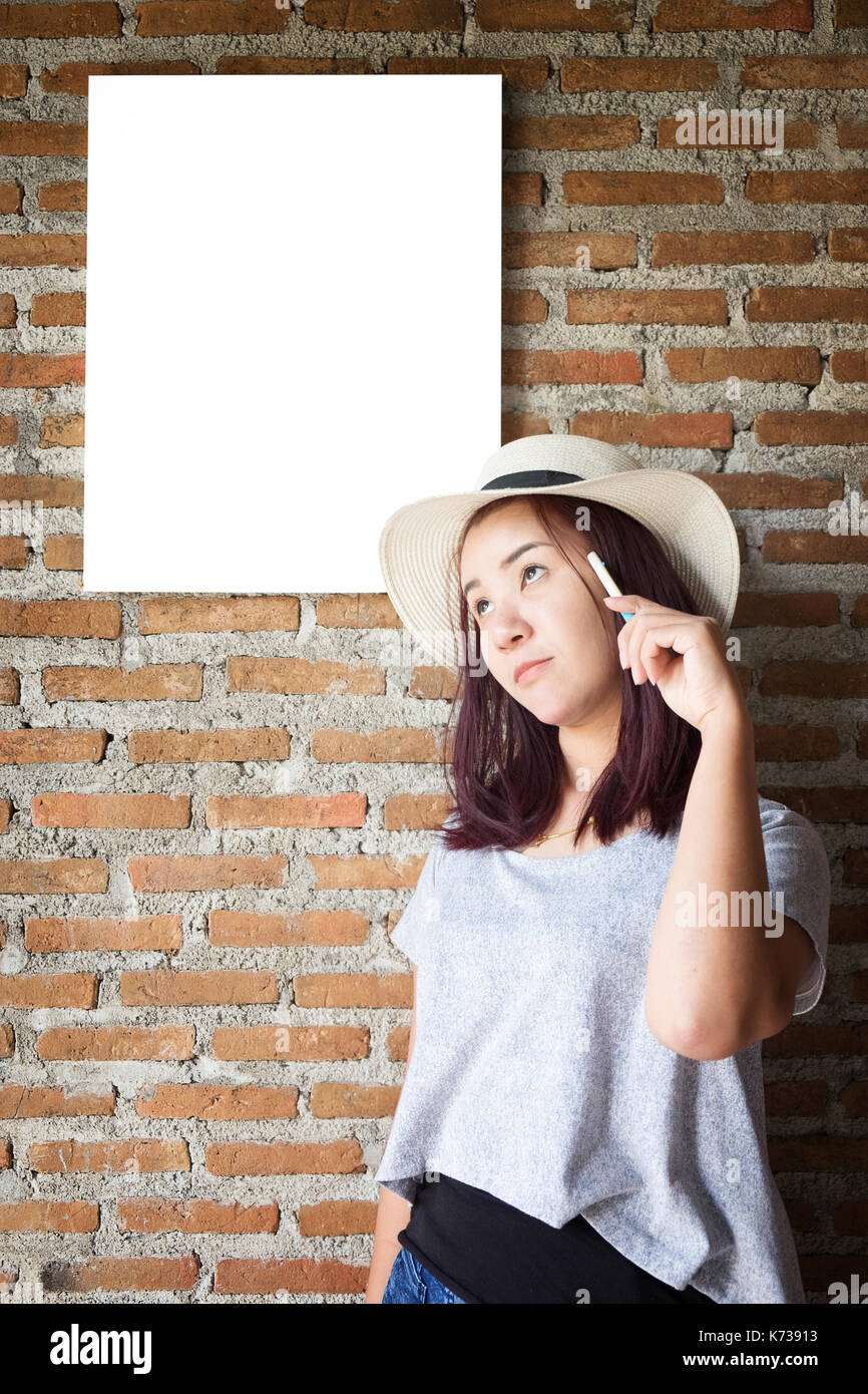 Portrait of young girl woman thinking and explain at the whiteboard ...