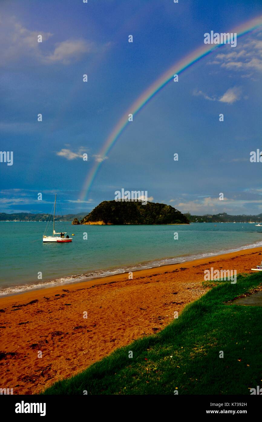 Rainbow over the Baby of Islands Stock Photo - Alamy