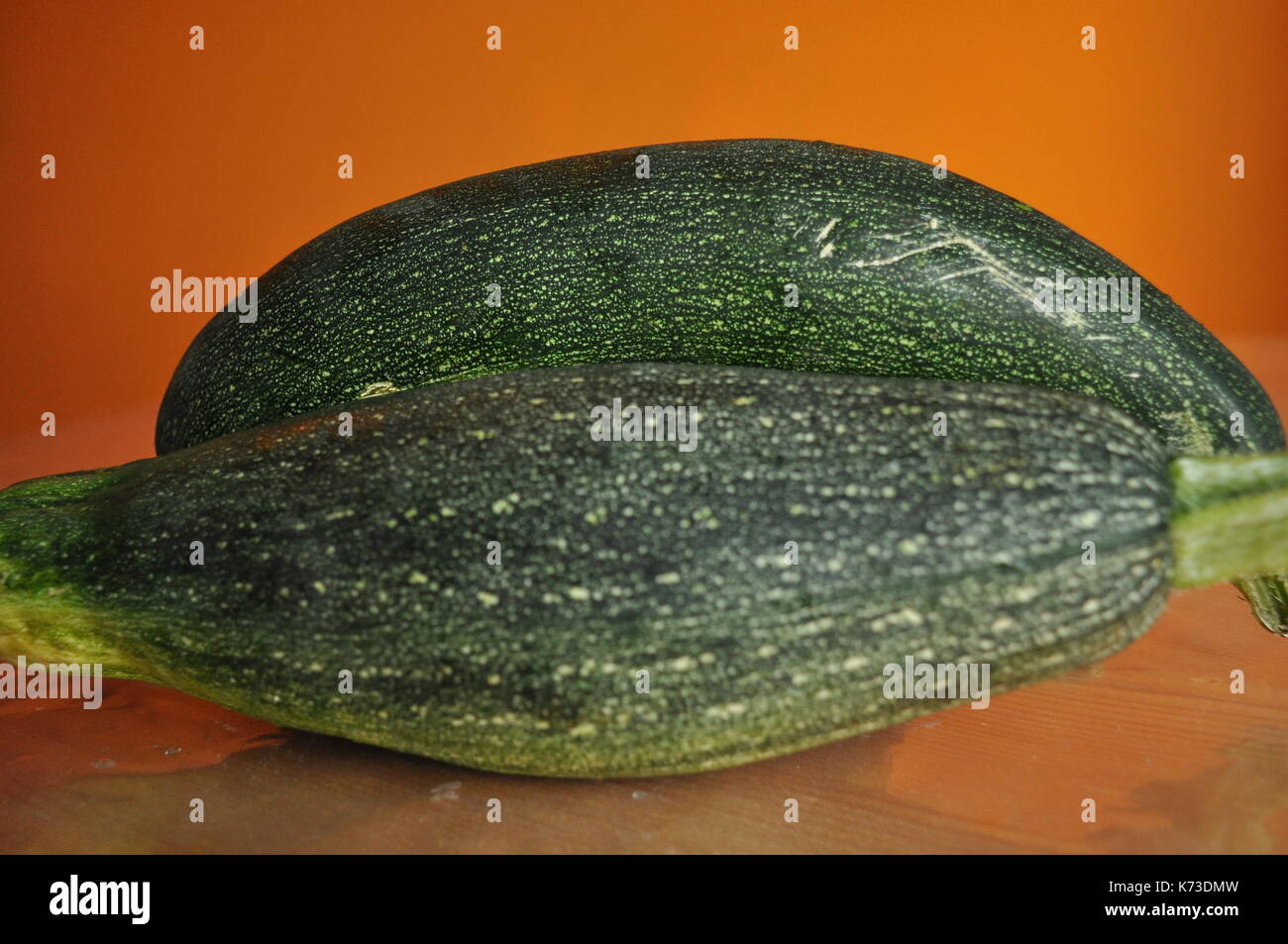 Courgette. Preparing vegetable dishes in a mortar Stock Photo - Alamy