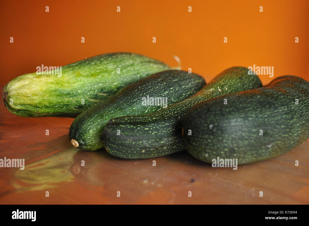 Courgette. Preparing vegetable dishes in a mortar Stock Photo - Alamy