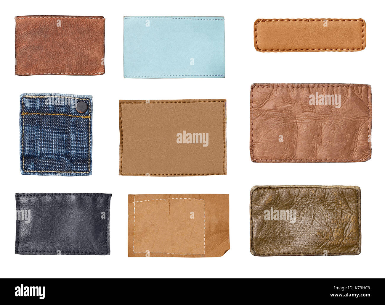 collection of various jeans labels on white background Stock Photo - Alamy