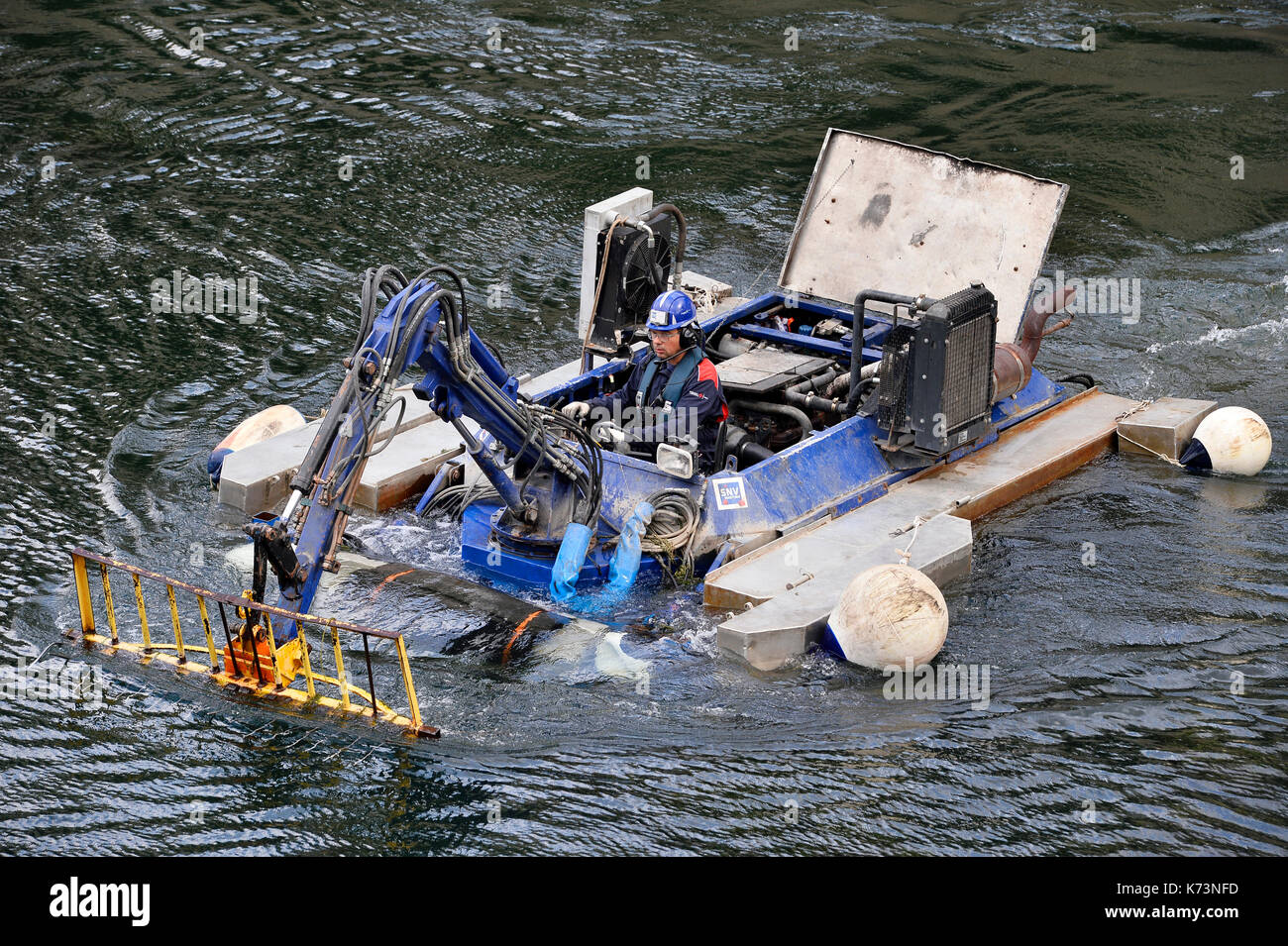 Rubbish collecting barge hi-res stock photography and images - Alamy