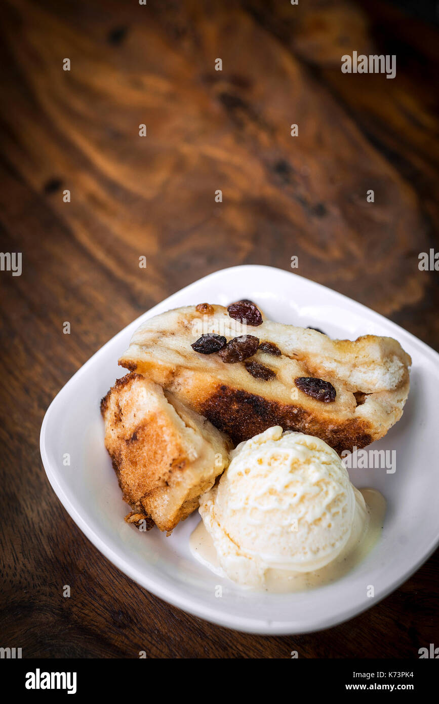 british traditional bread pudding with vanilla ice cream dessert Stock ...