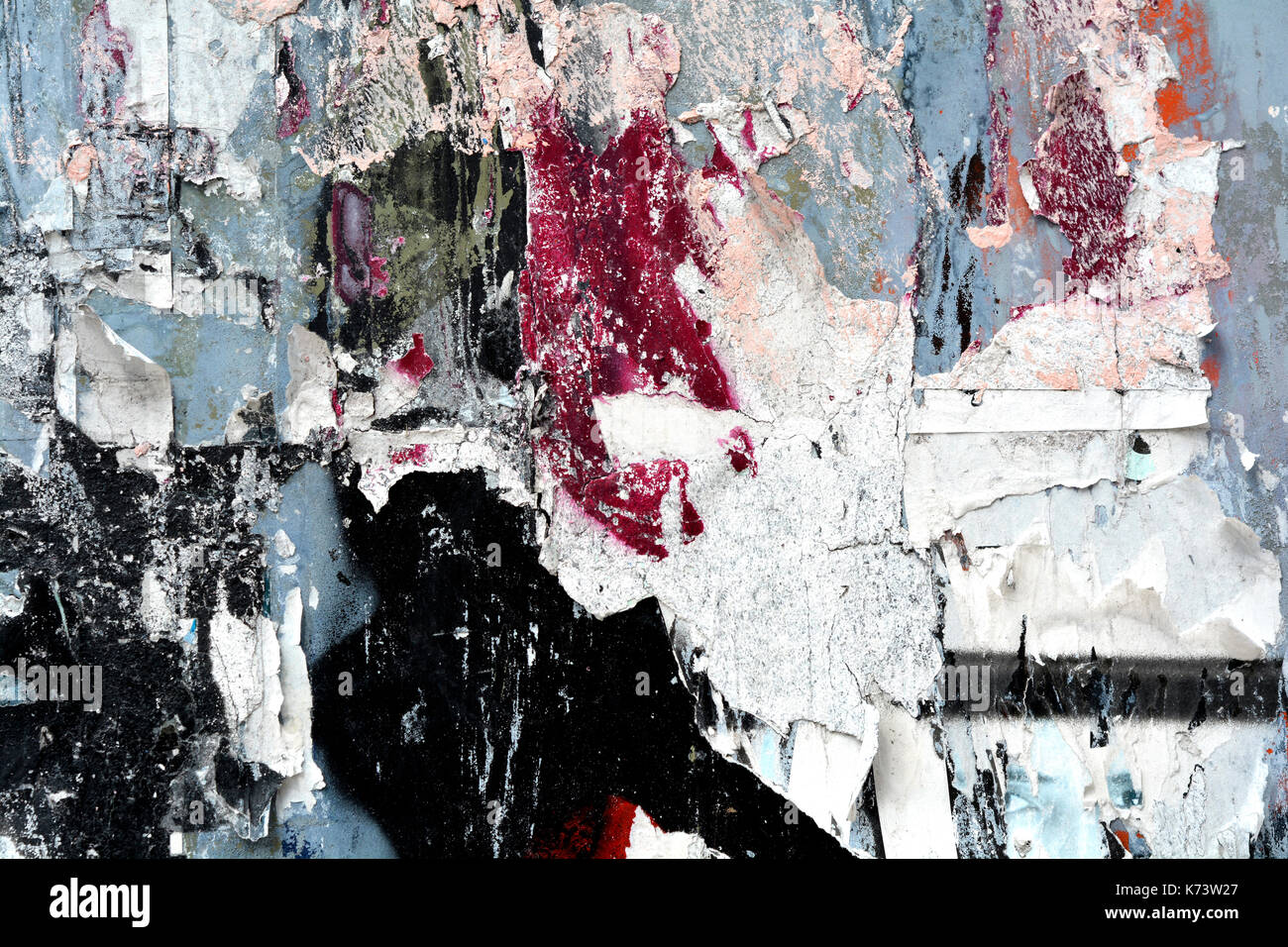 a texture closeup of torn posters with spray paint Stock Photo - Alamy