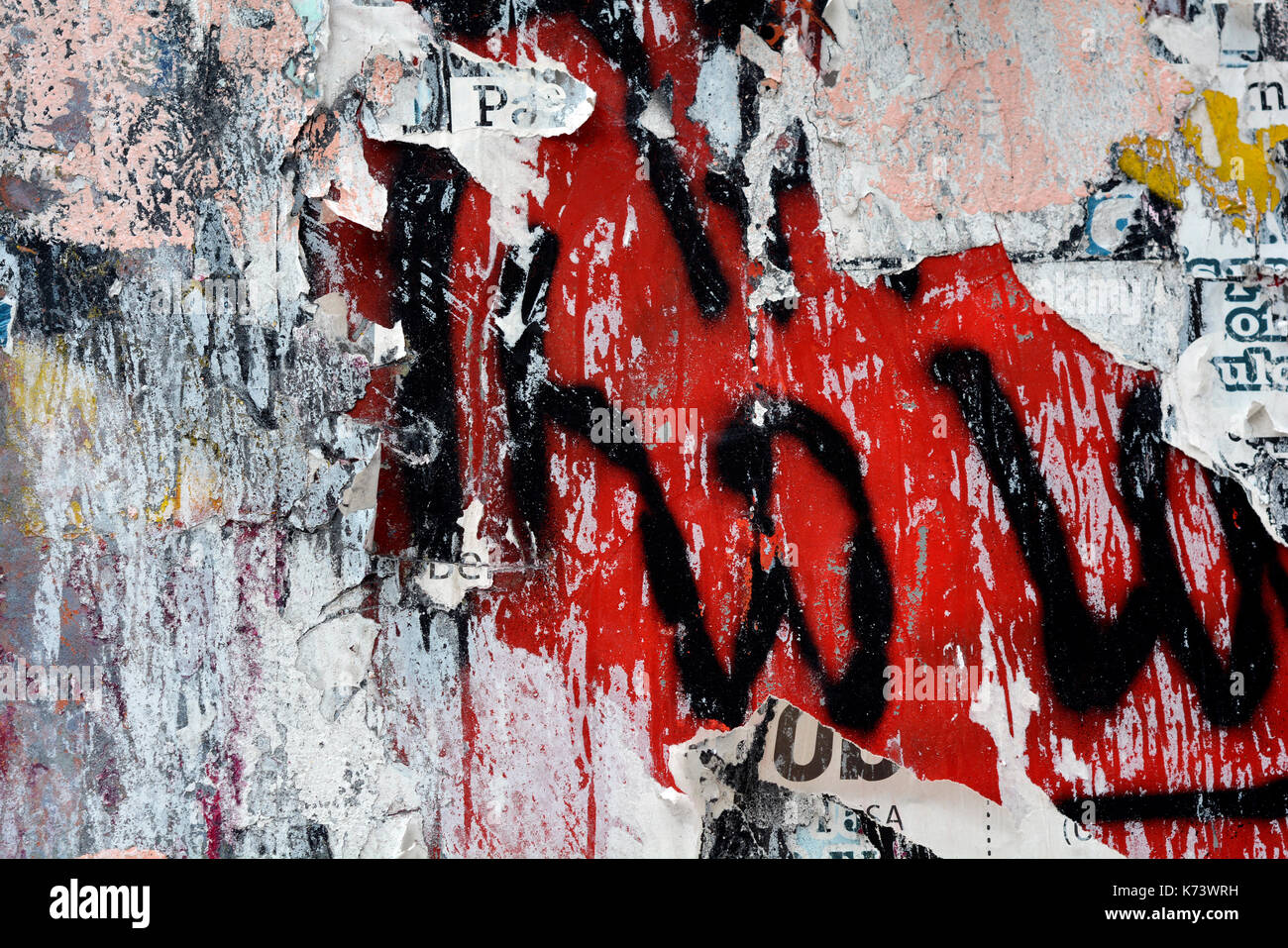 a layered graffiti and torn poster background Stock Photo - Alamy