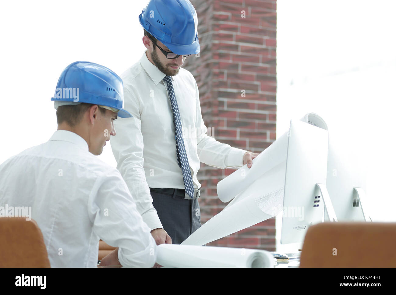 architect and construction foreman to discuss a new project Stock Photo ...