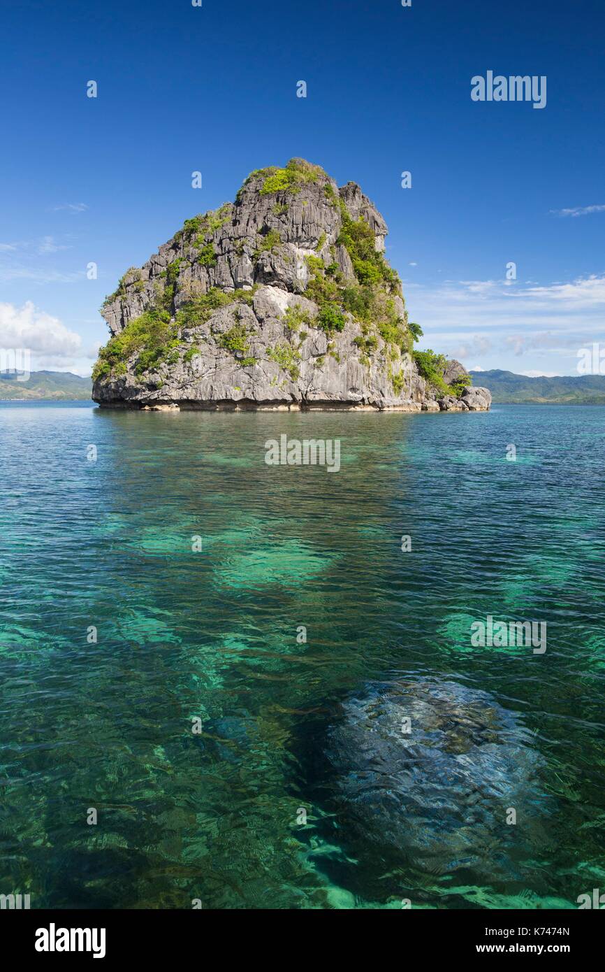 Philippines, Palawan, Taytay Bay, Talacanen Island surrounded by coral ...