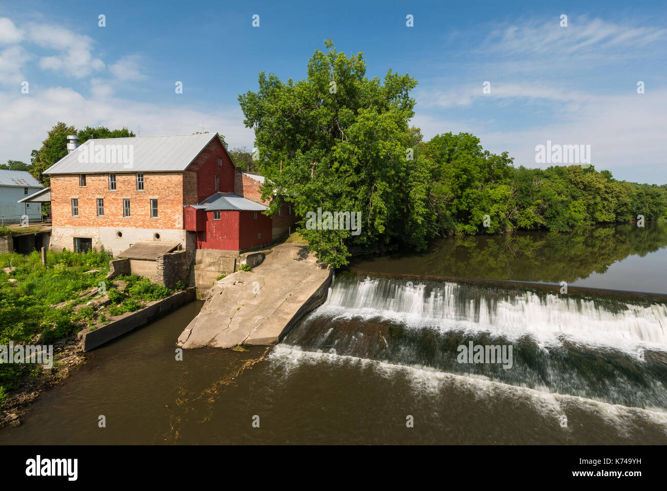 Old Mill and Dam Along A River Stock Photo - Alamy