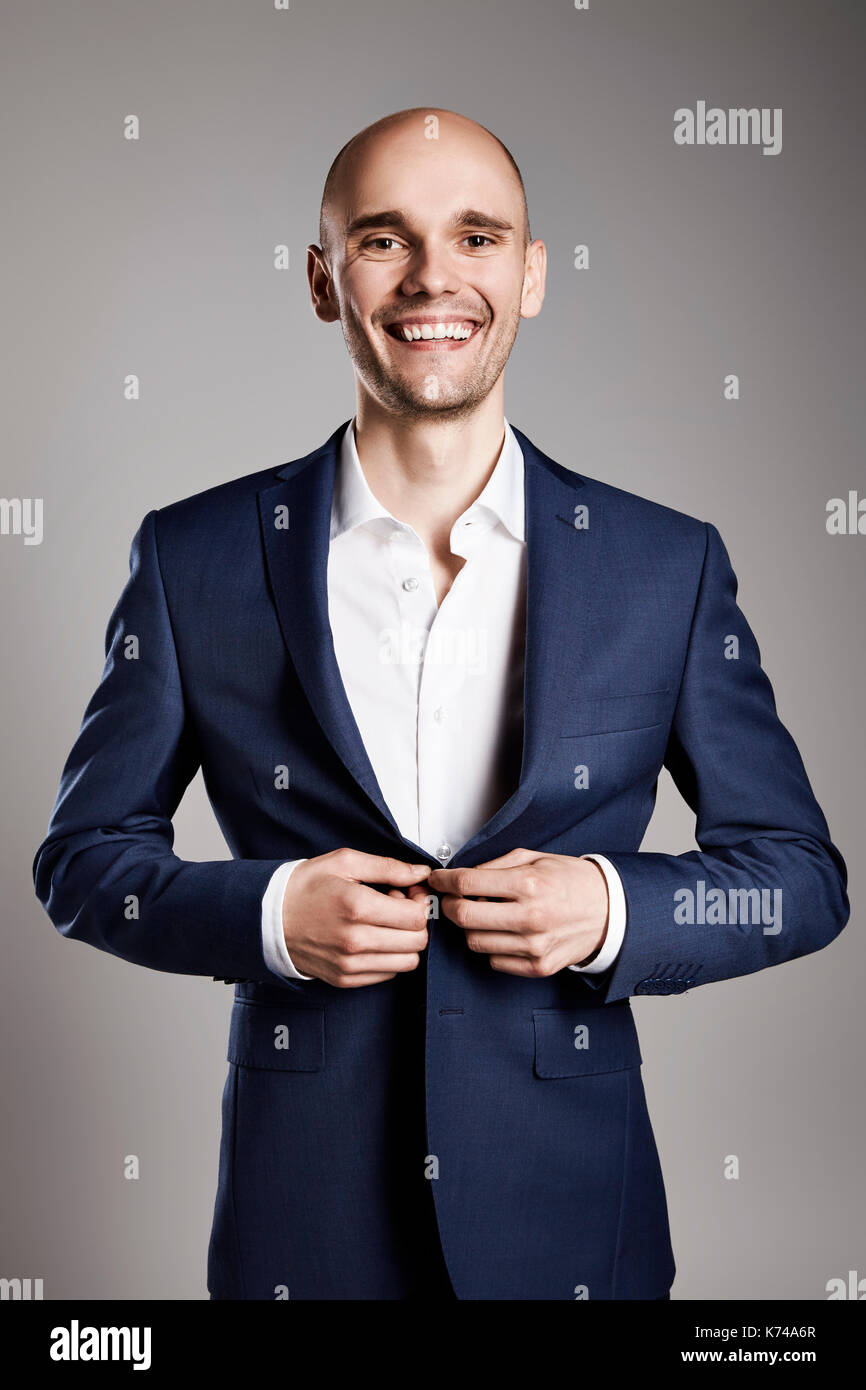 Man getting dressed suit hi-res stock photography and images - Alamy