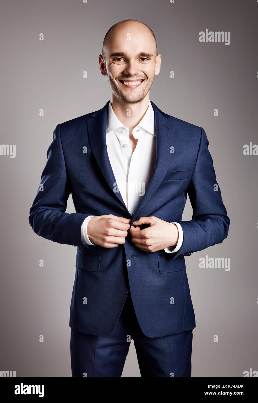 Business man, smiling, suit hi-res stock photography and images - Alamy