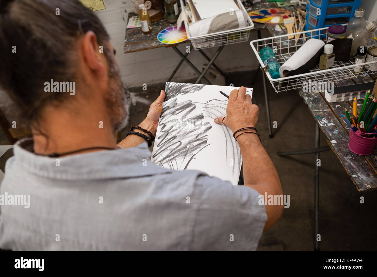 Man sketching hi-res stock photography and images - Alamy