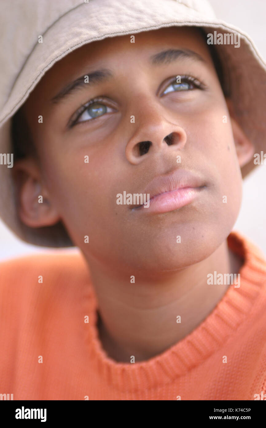 African american male teen contemplate hi-res stock photography and ...