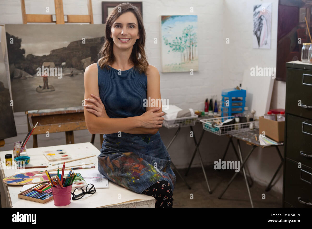 Beautiful woman sitting table drawing hi-res stock photography and ...