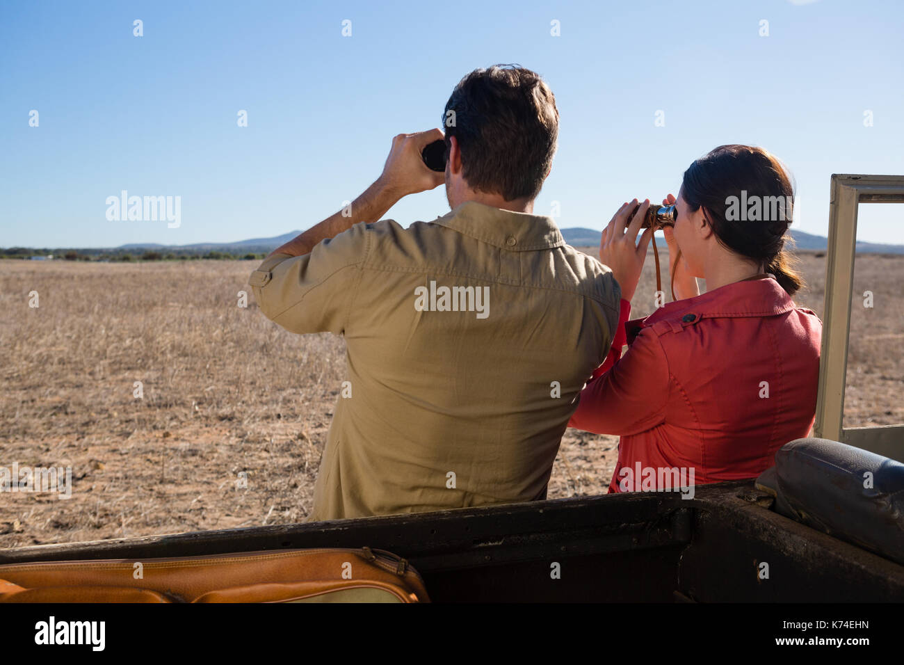 Binoculars View Woman Rear View High Resolution Stock Photography and ...