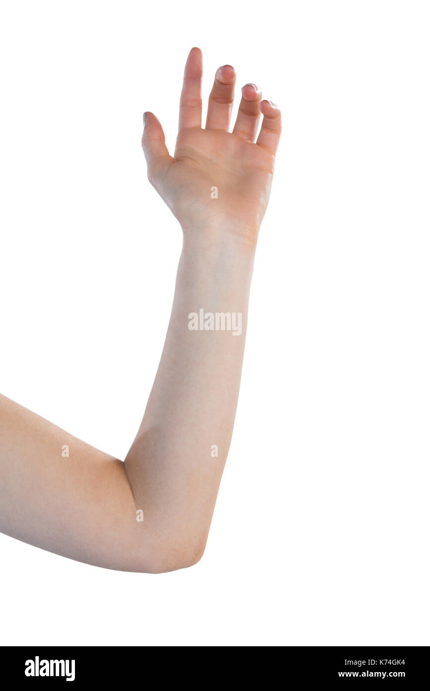 Cropped image of waving hand against white background Stock Photo - Alamy