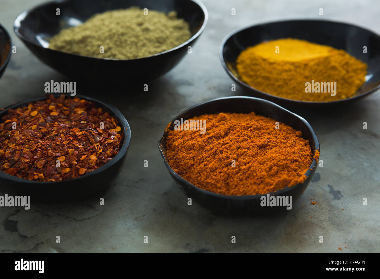 Cinnamon powder in bowl close hi-res stock photography and images - Alamy