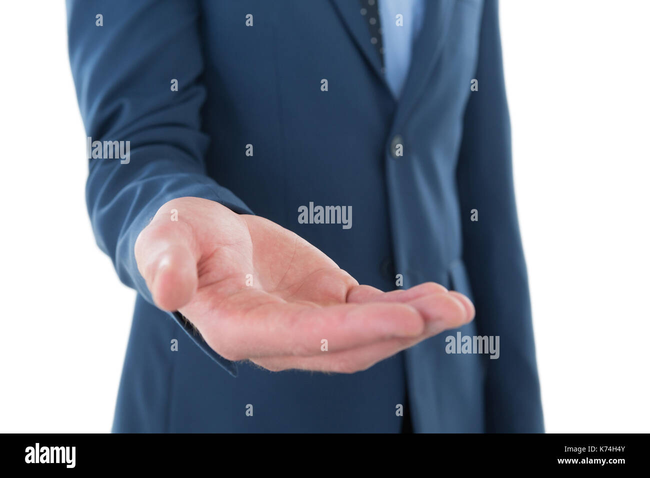 Mid section of businessman promoting invisible product while standing ...