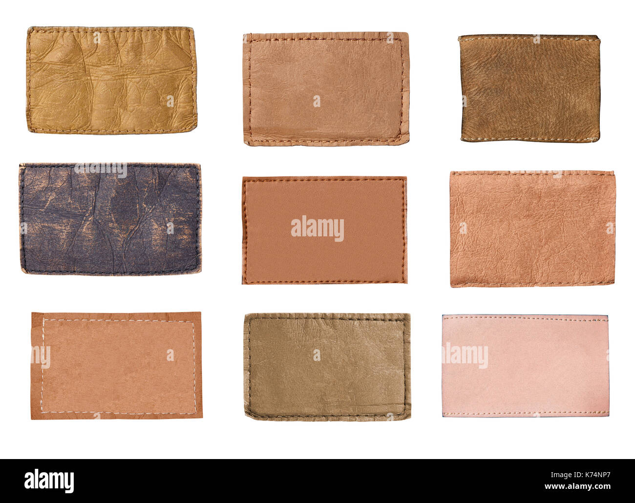 collection of various jeans labels on white background Stock Photo - Alamy