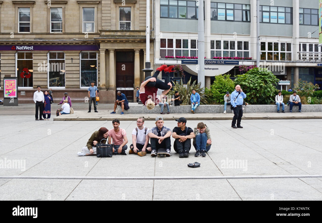 Urban acrobat, jumping a group of 7 Stock Photo - Alamy