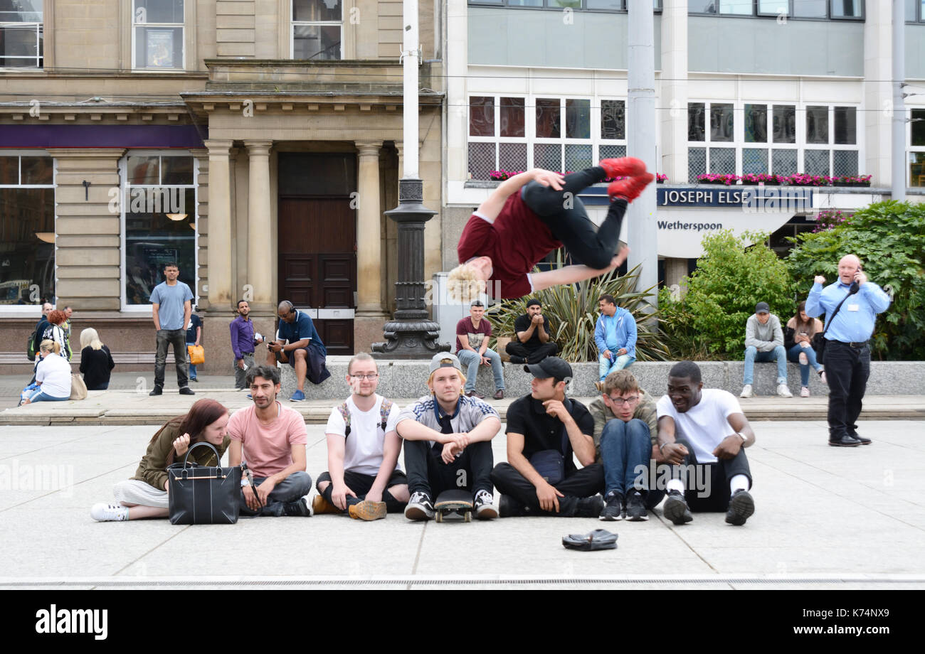 Urban acrobat, jumping a group of 7 Stock Photo - Alamy