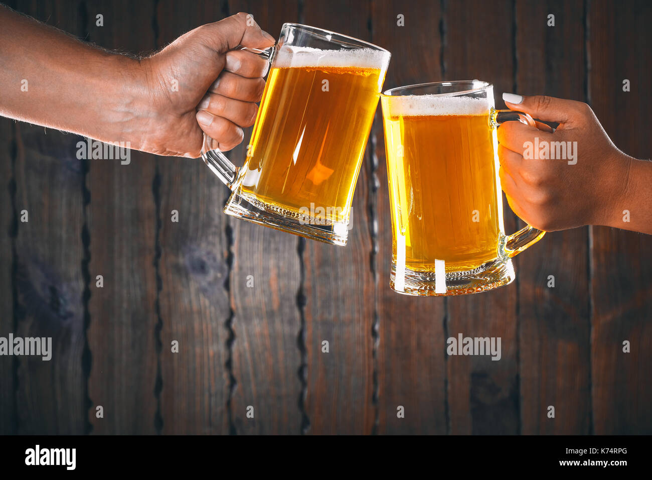 Toasting beer mug hi-res stock photography and images - Alamy