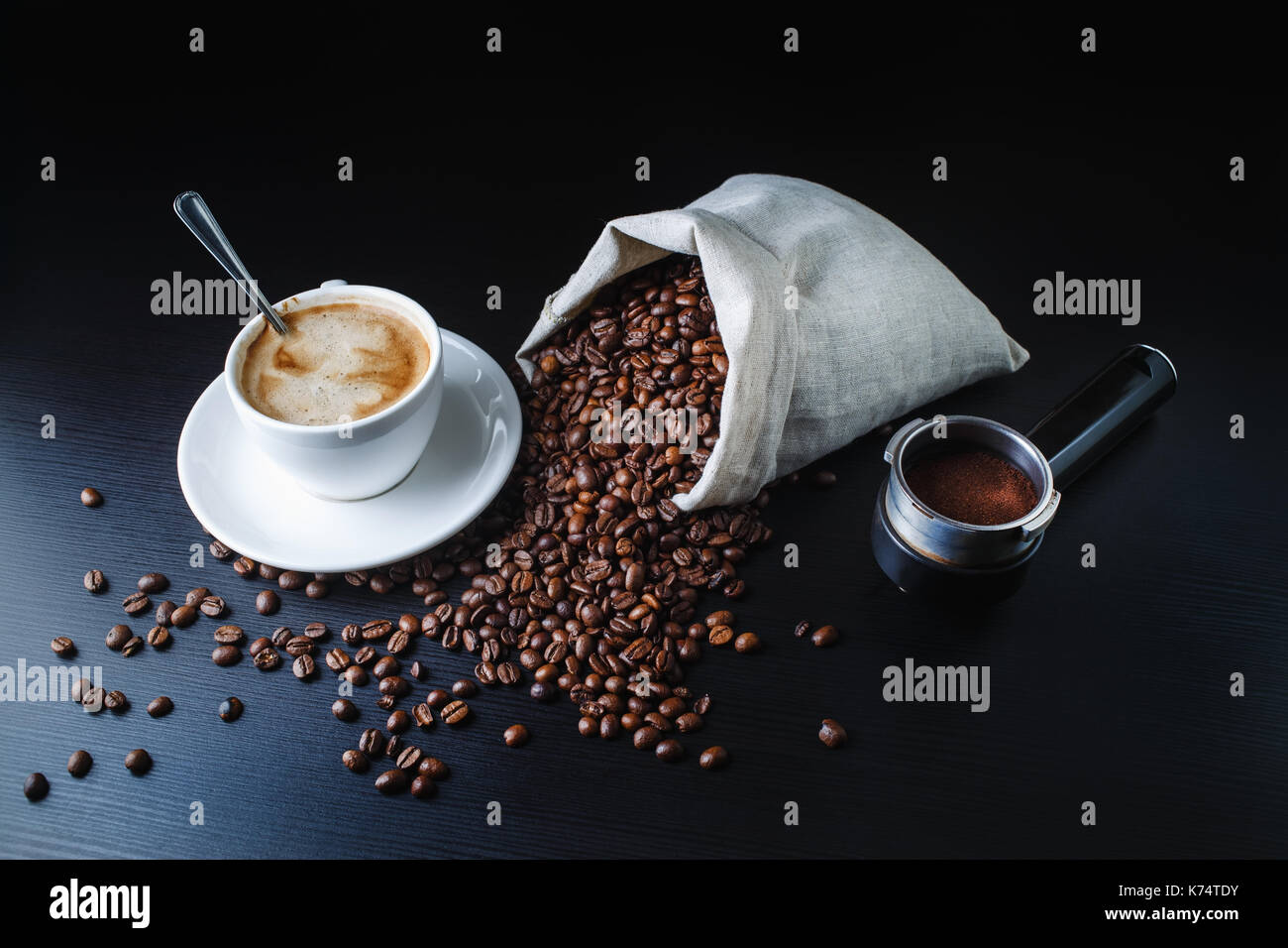 Still life with coffee. Coffee cup, holder from espresso machine ...