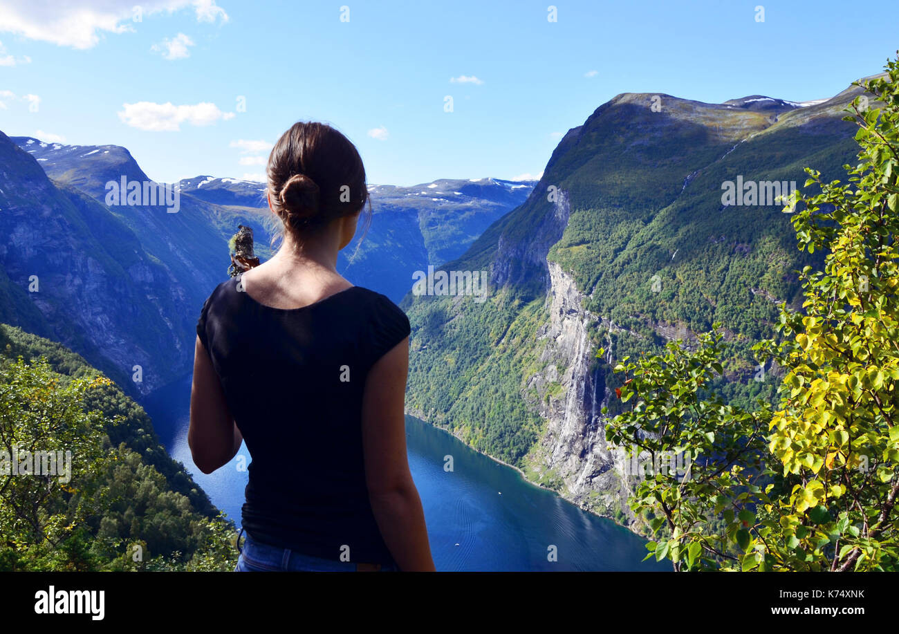 Geiranger, Norway - September 3rd, 2017: Girl hiking to Seven Sisters ...