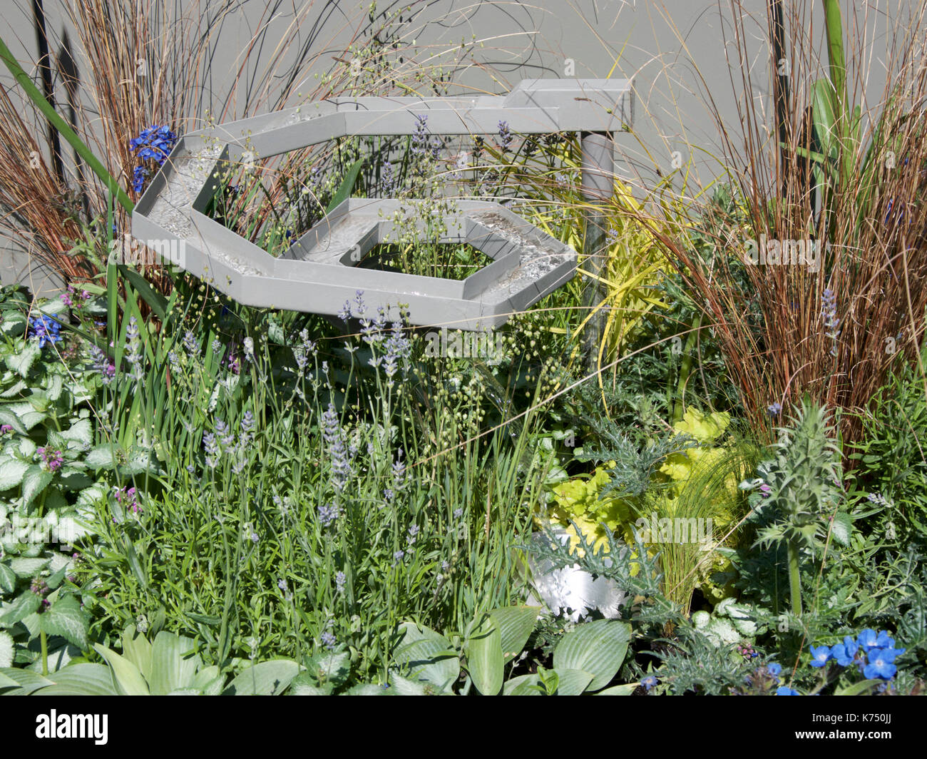Hexagonal water feature in the Mind Trap garden at RHS Chelsea Flower ...