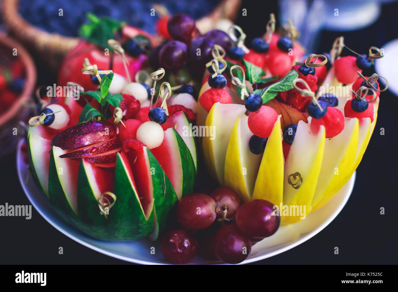 Beautifully decorated catering banquet table with different food snacks ...