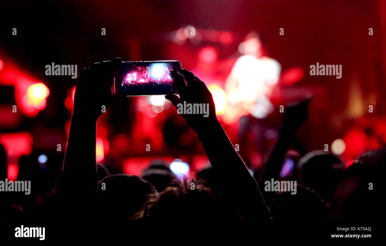 modern smartphones during live concert of a rock band on stage Stock ...