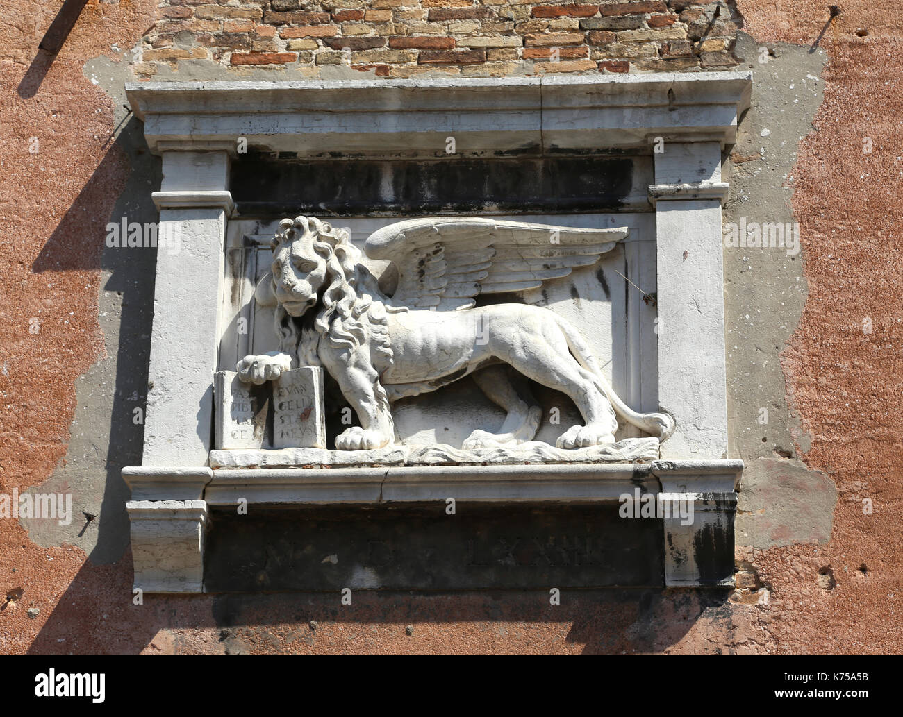 statue of the winged lion symbol of the city of Venice in Northern ...