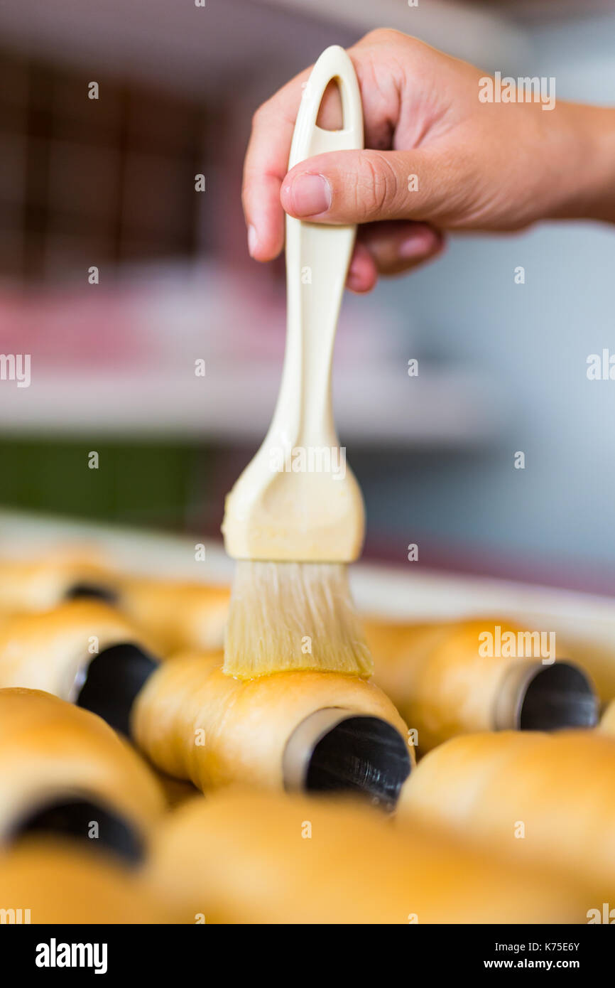 Woman baker basket bread hi-res stock photography and images - Alamy