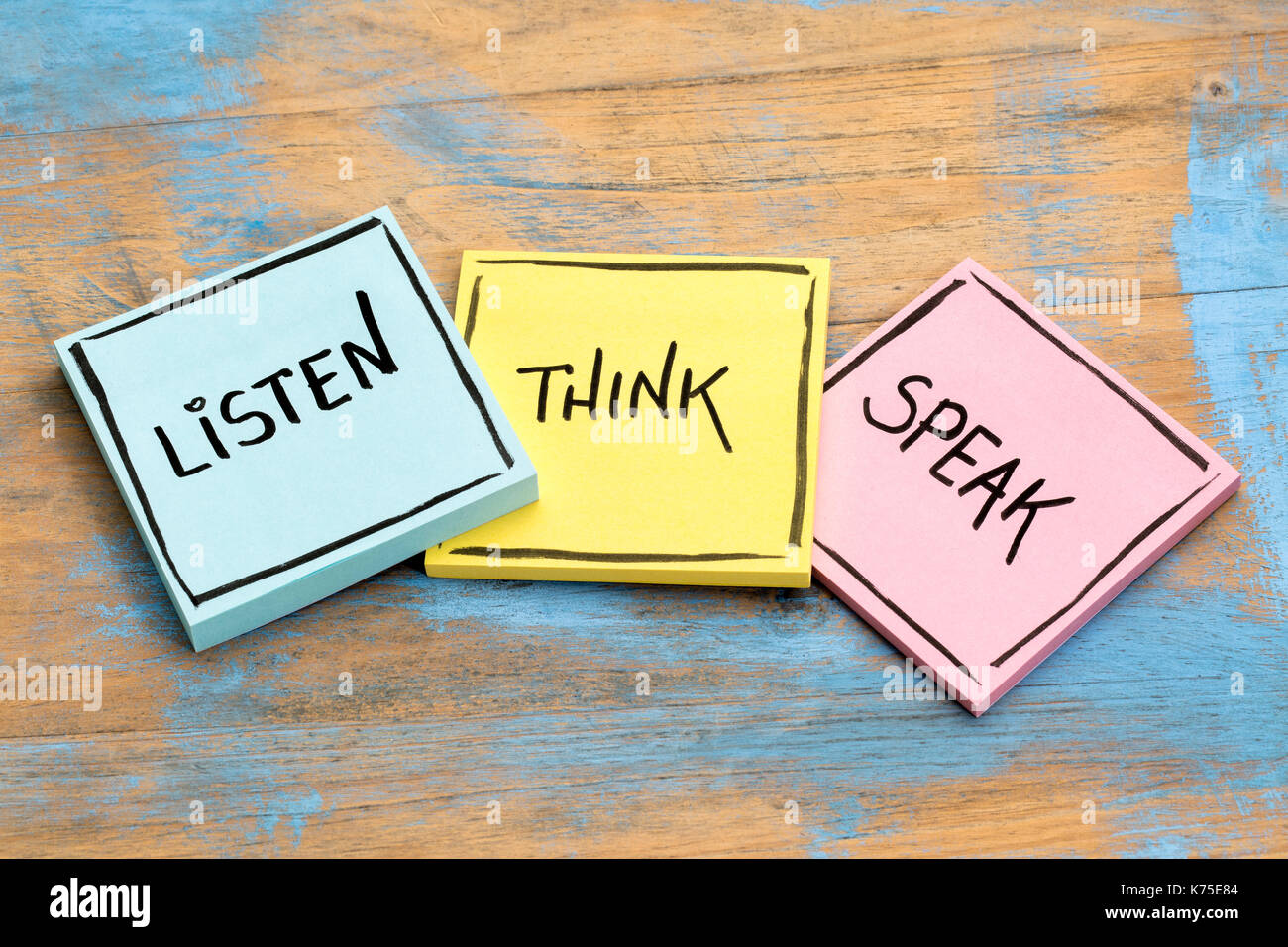 listen, think, speak - communication concept - handwriting in black ink ...