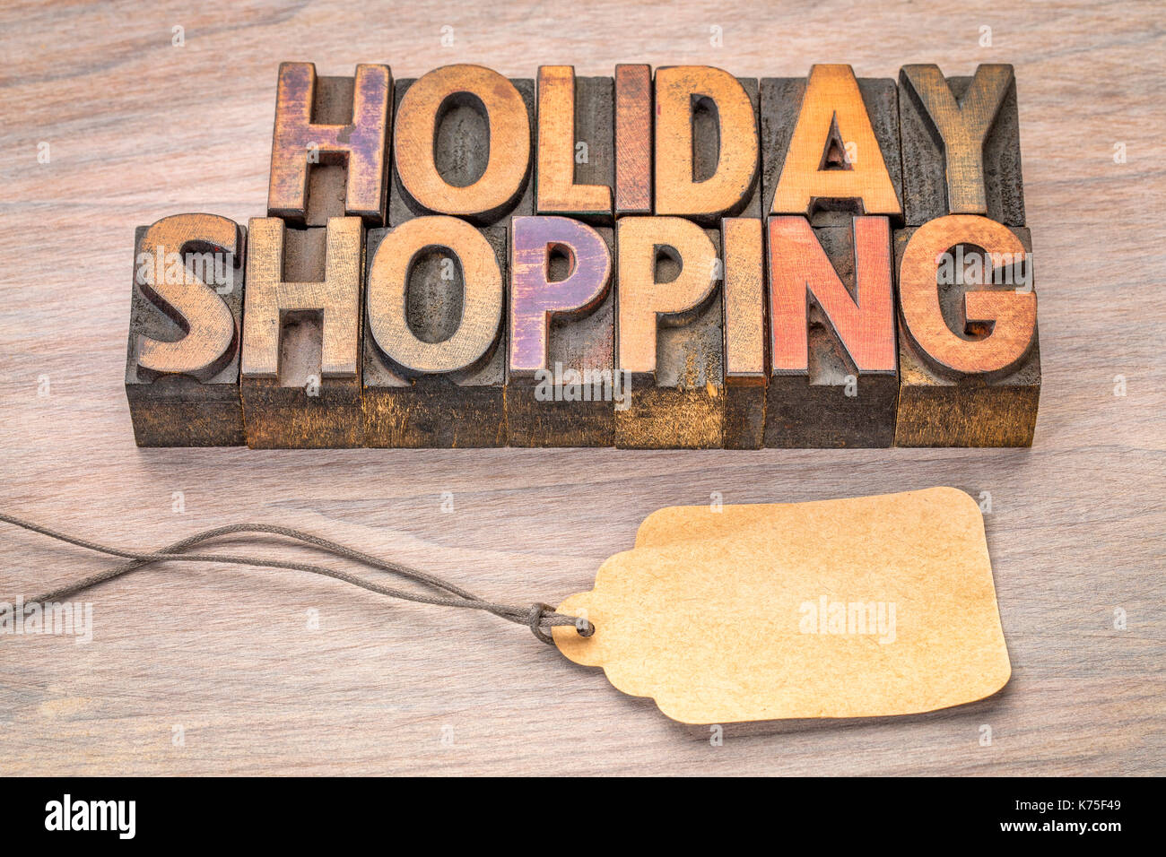 holiday shopping word abstract in vintage letterpress wood type with a ...