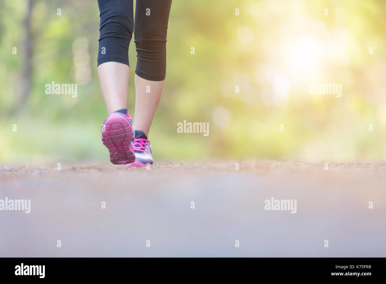 ํYoung fitness woman legs running Stock Photo - Alamy
