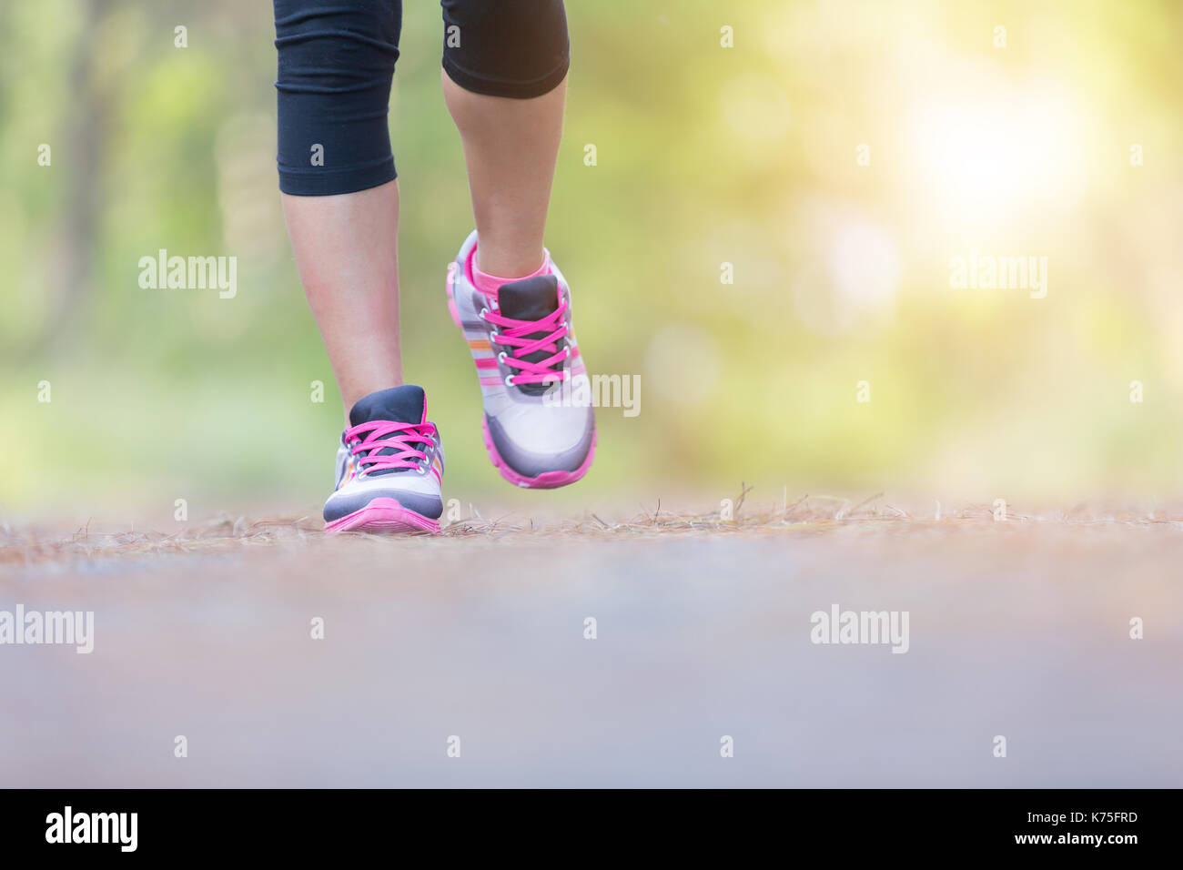 ํYoung fitness woman legs running Stock Photo - Alamy