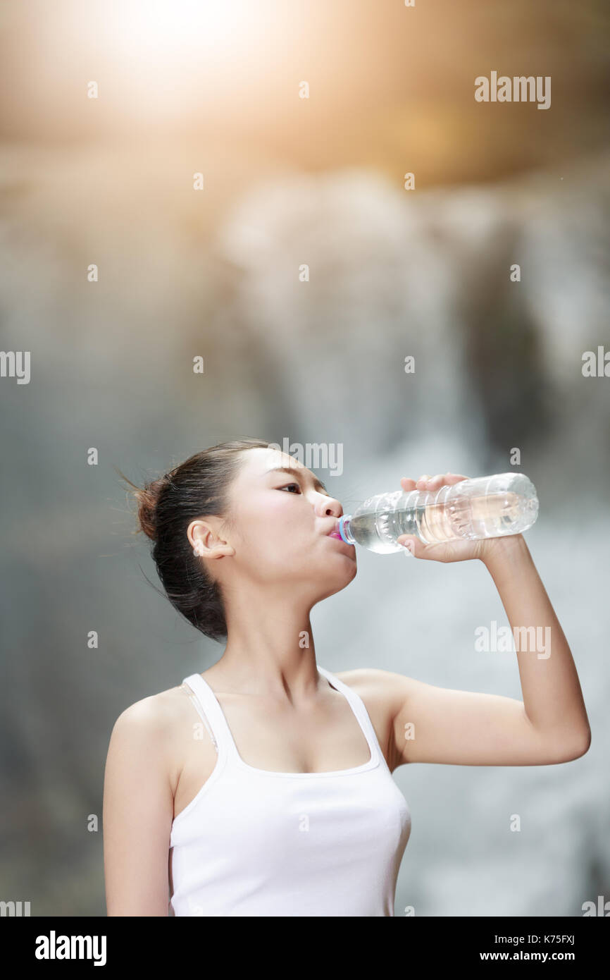 Women drink water Stock Photo - Alamy