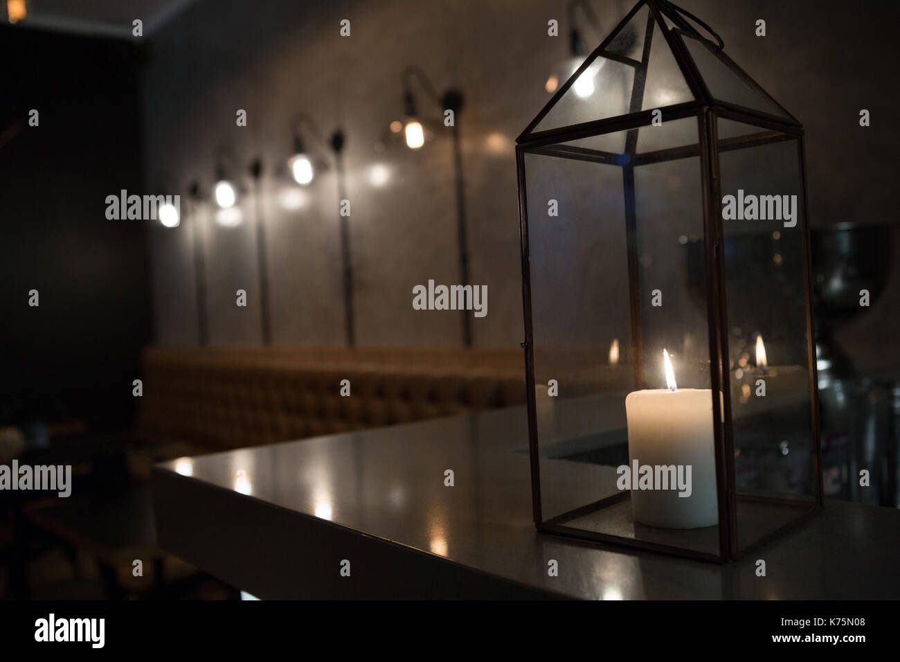 Laptop lit candle table restaurant hi-res stock photography and images ...