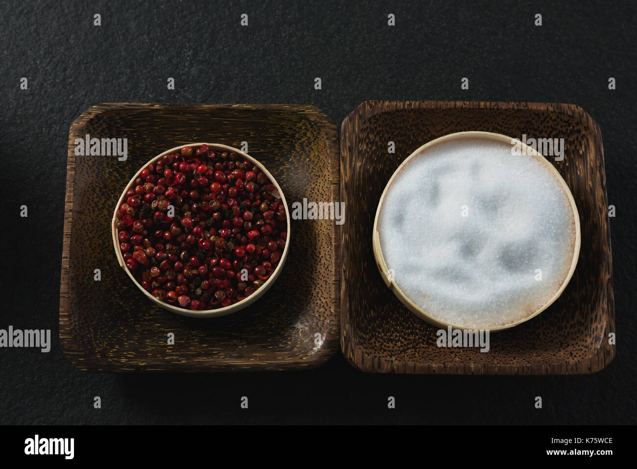Close-up of pink pepper and salt in a plate Stock Photo - Alamy