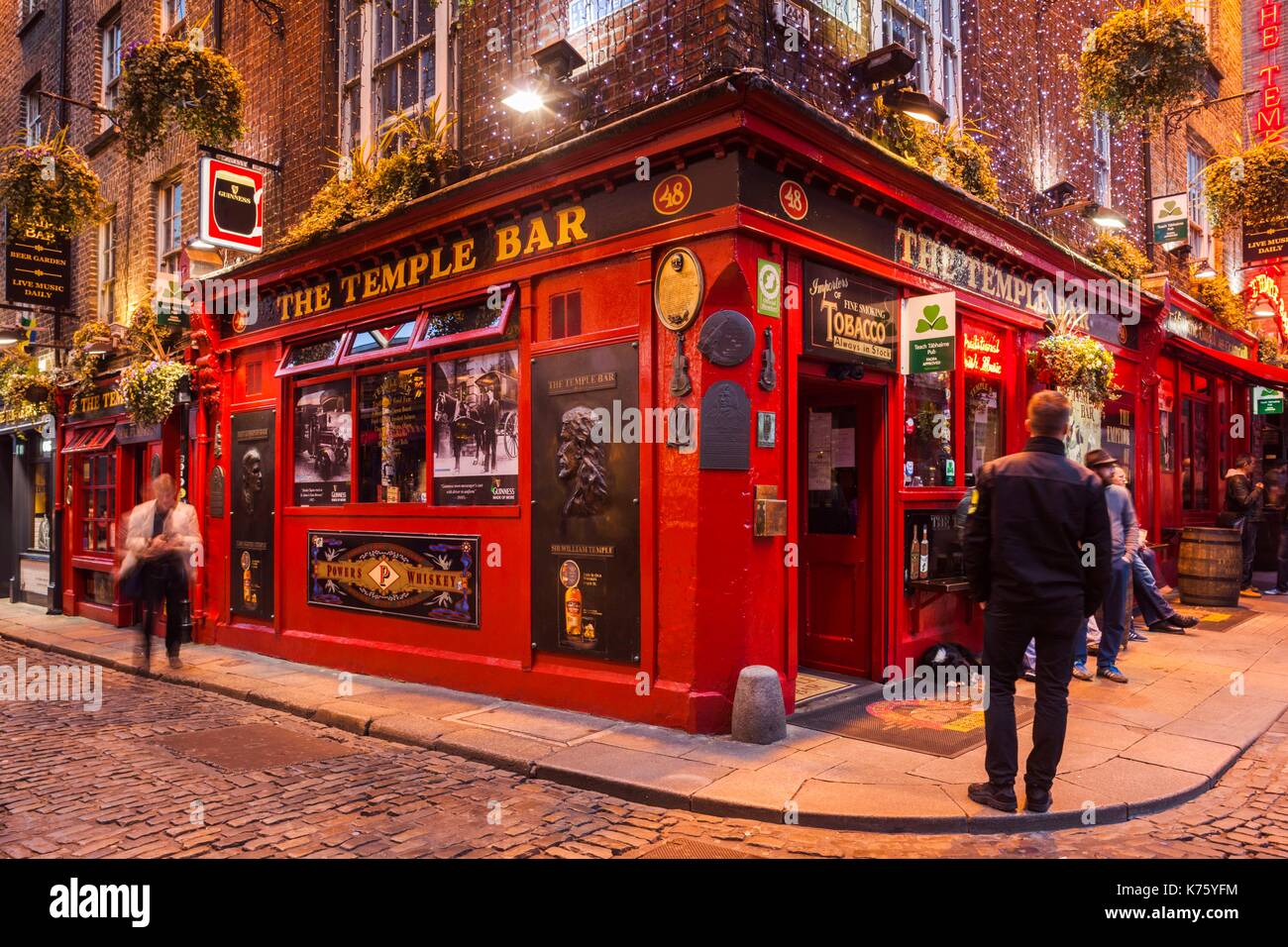 Ireland, Dublin, Temple Bar area, traditional pub exterior, The Temple Bar Pub, dusk Stock Photo ...